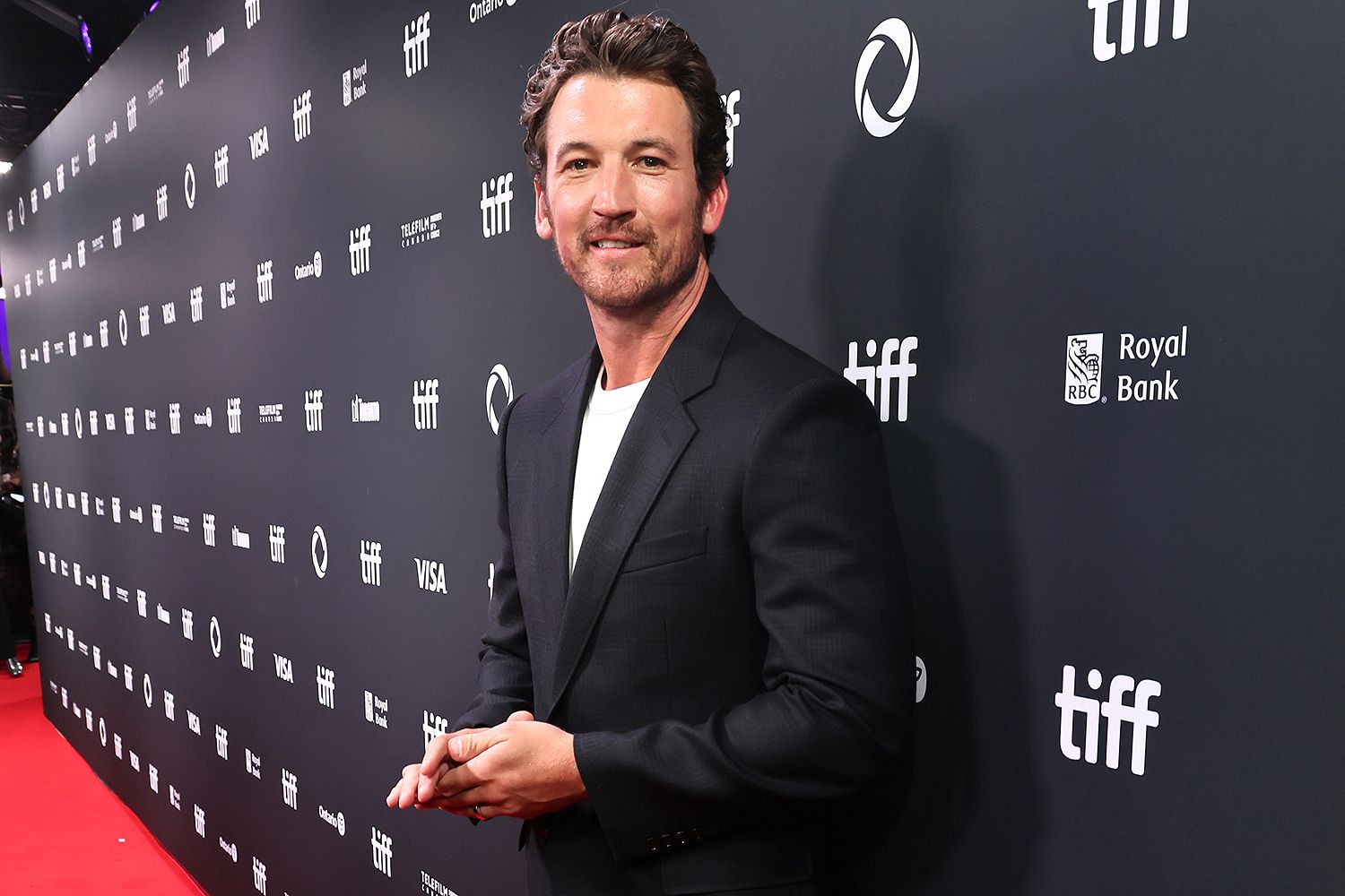 Miles Teller Says He Values an 'Ordinary Love' While Debuting New ...
