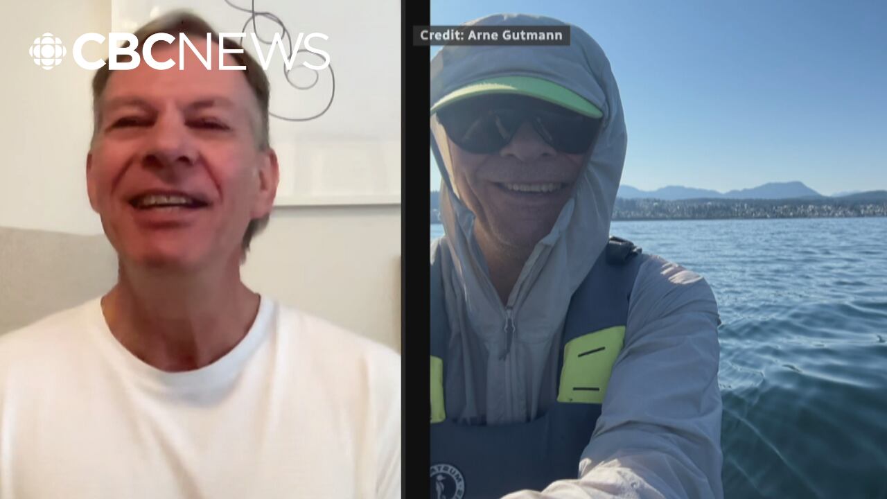 What was a paddleboarder doing in the middle of the Strait of Georgia?