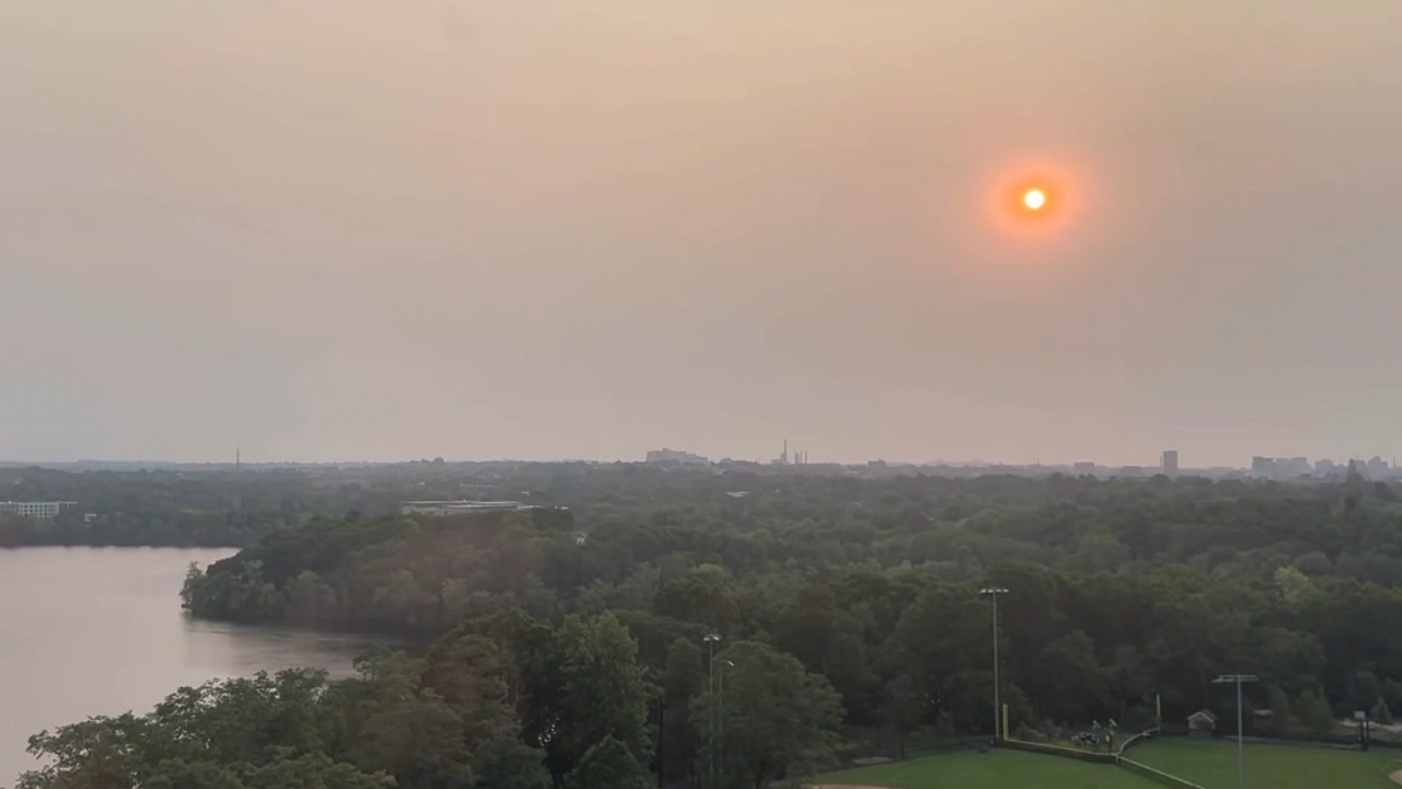 Sunrise through haze in Cambridge, Massachusetts, USA