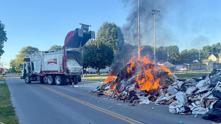 Trash inside garbage truck catches fire in Tiffin