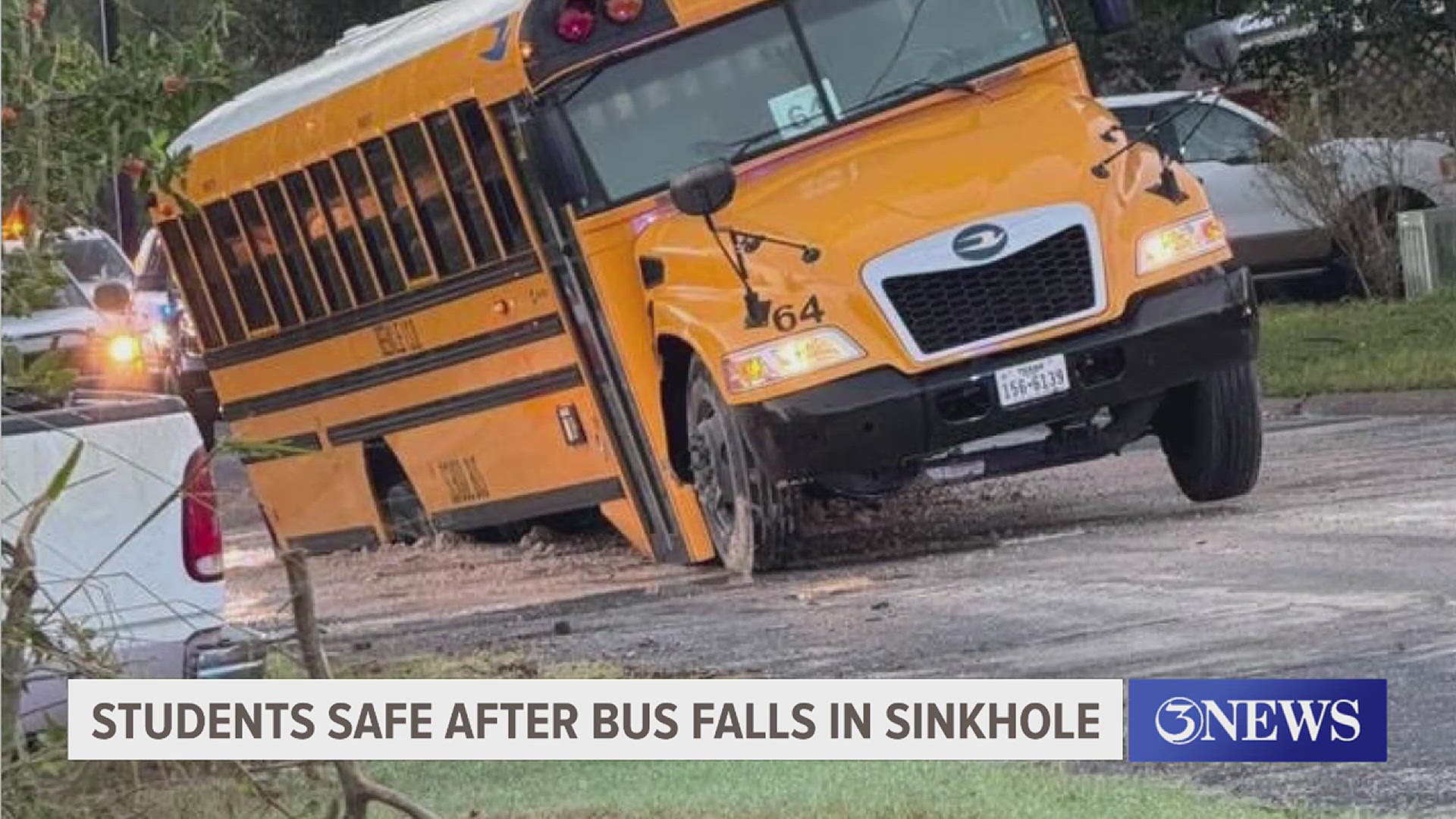 Students safe after bus falls into sinkhole