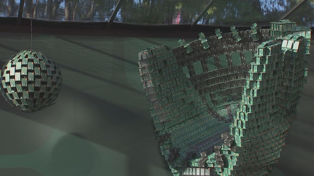 Giant baseball glove made of credit cards pops up at Citizens Bank Park ...