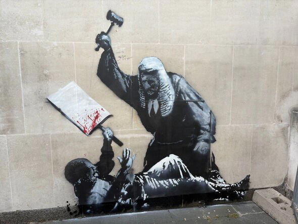 New Banksy mural of judge beating a protester to be removed from ...
