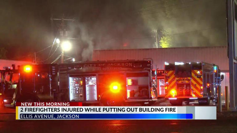 Two Jackson firefighters injured while responding to fire