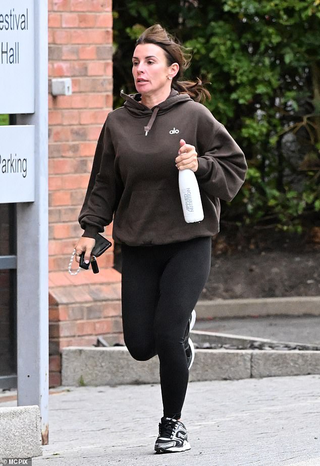 Coleen Rooney sprints to the gym in workout gear following her NTAs success