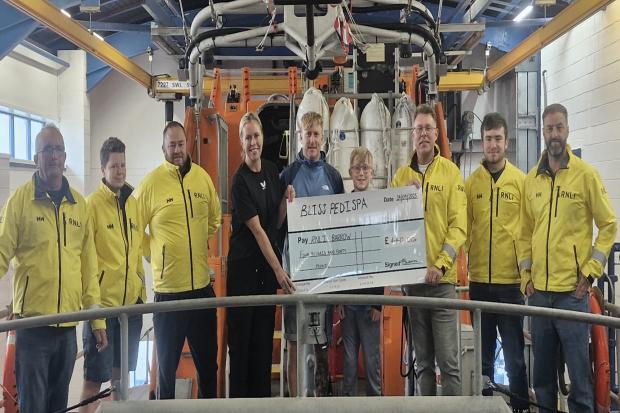 Barrow lifeboat crew receives donation from local business