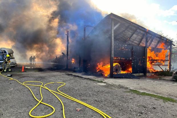 Multiple vehicles engulfed in flames as crews tackle south Essex farm fire