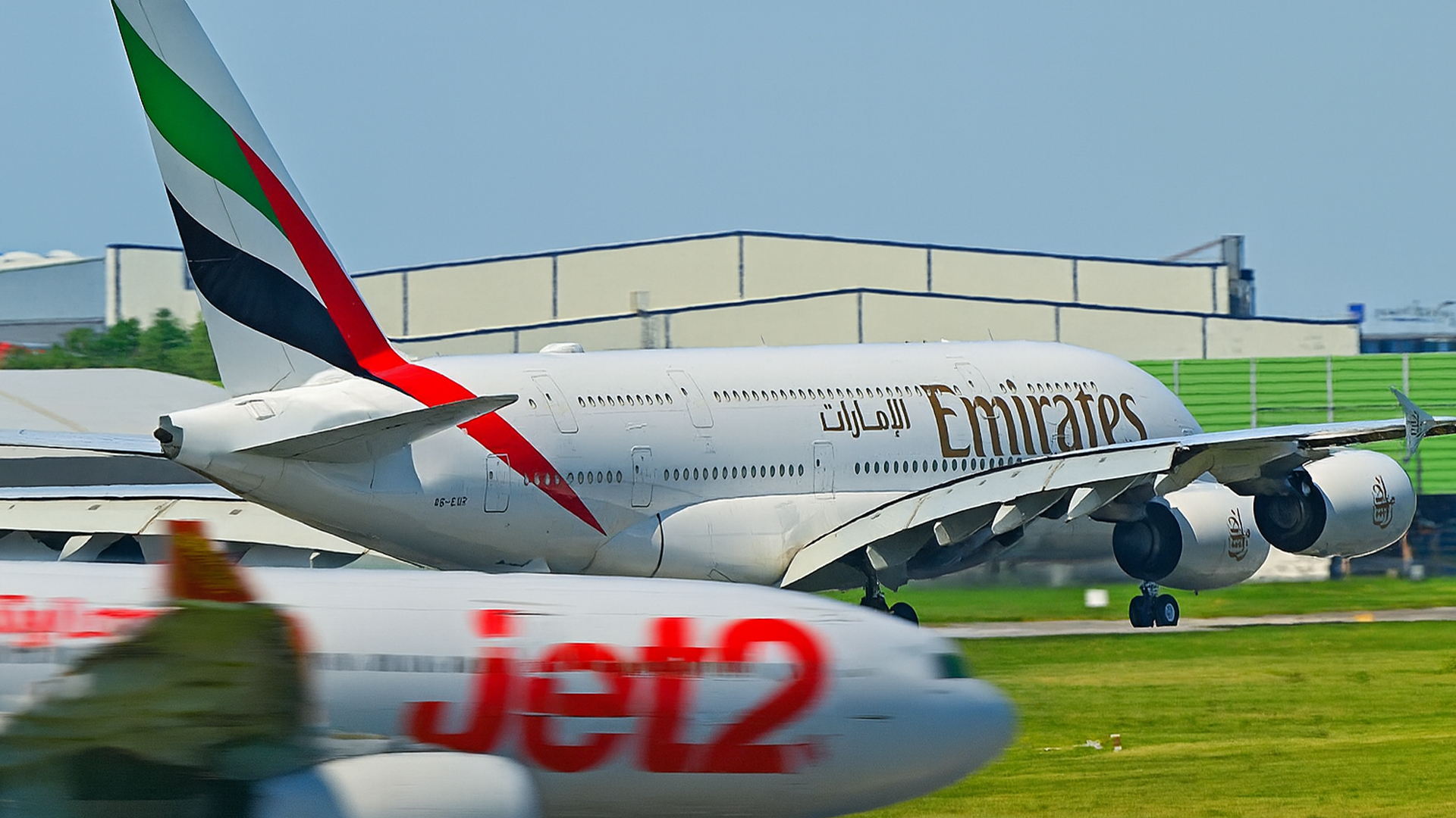 Two Giant Aircraft Operate Side by Side on the Runway