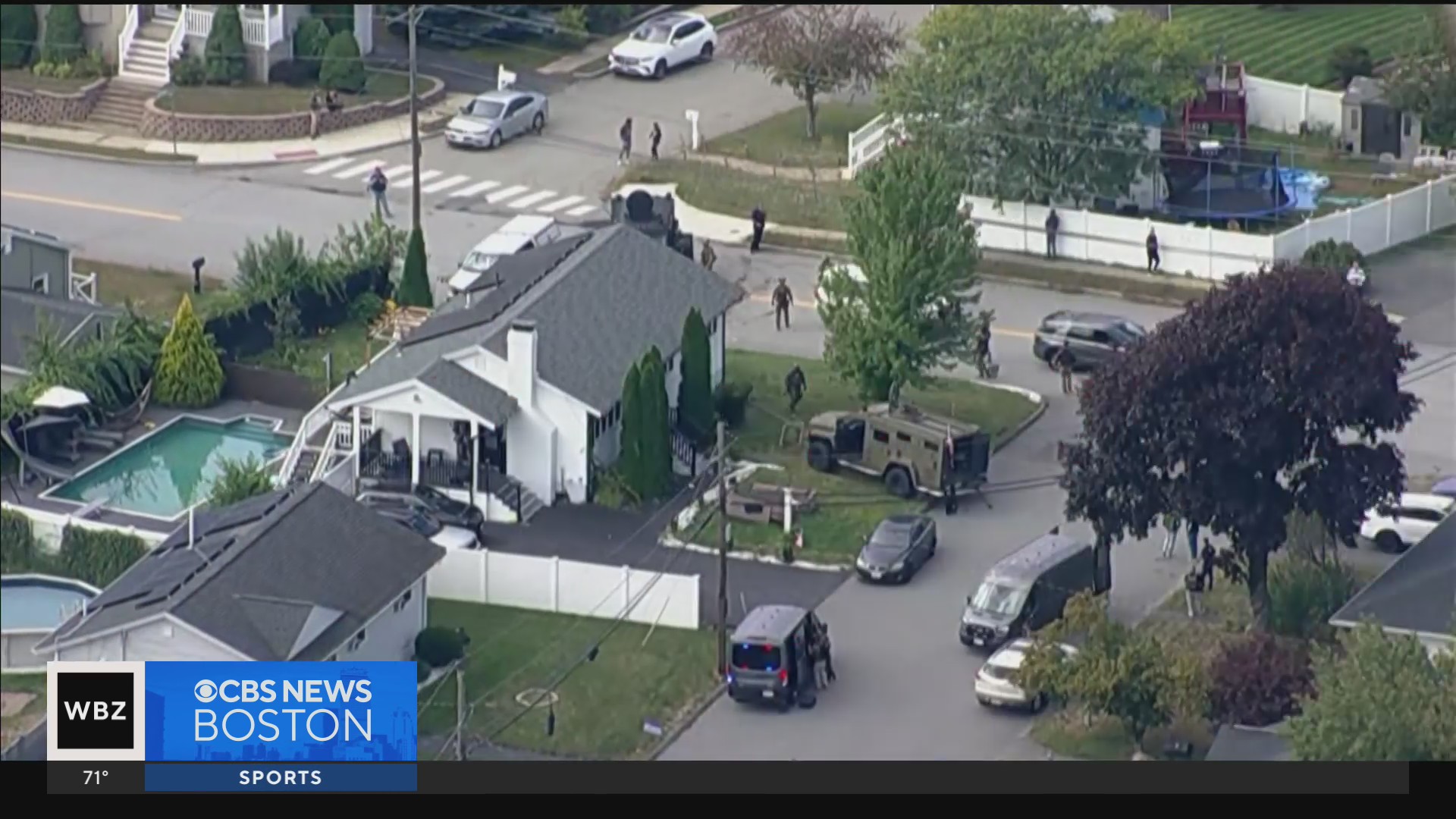 SWAT team converges on home in Lawrence, Massachusetts