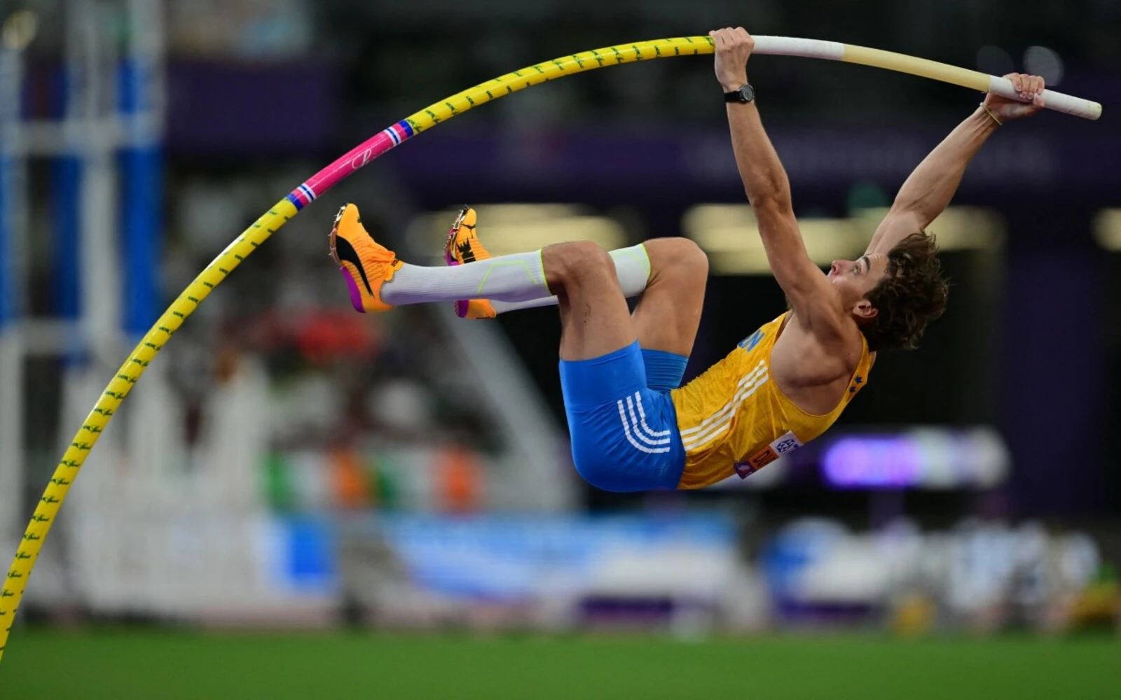 Duplantis sets new pole vault record as retains world title