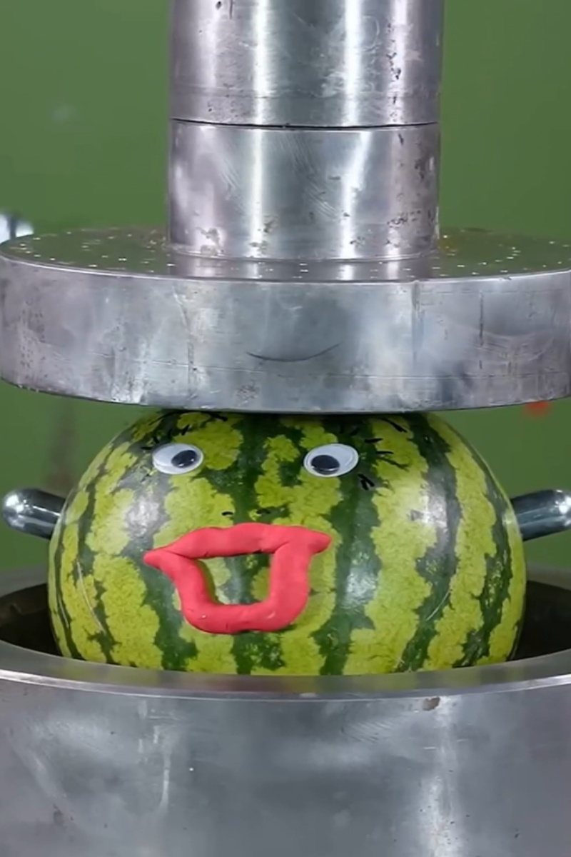Funny watermelon in hydraulic press
