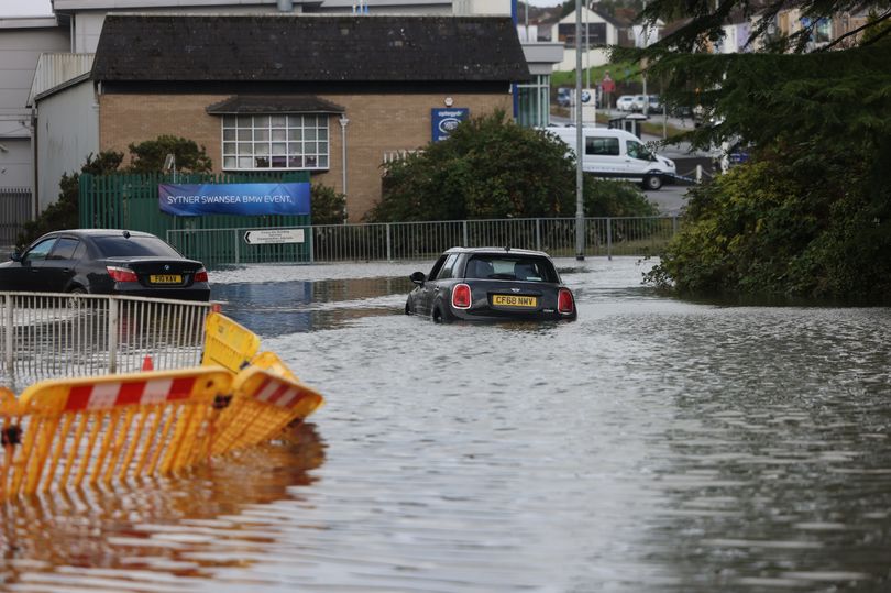 Businessowner 'ran for his life' after flood left two feet of water in ...