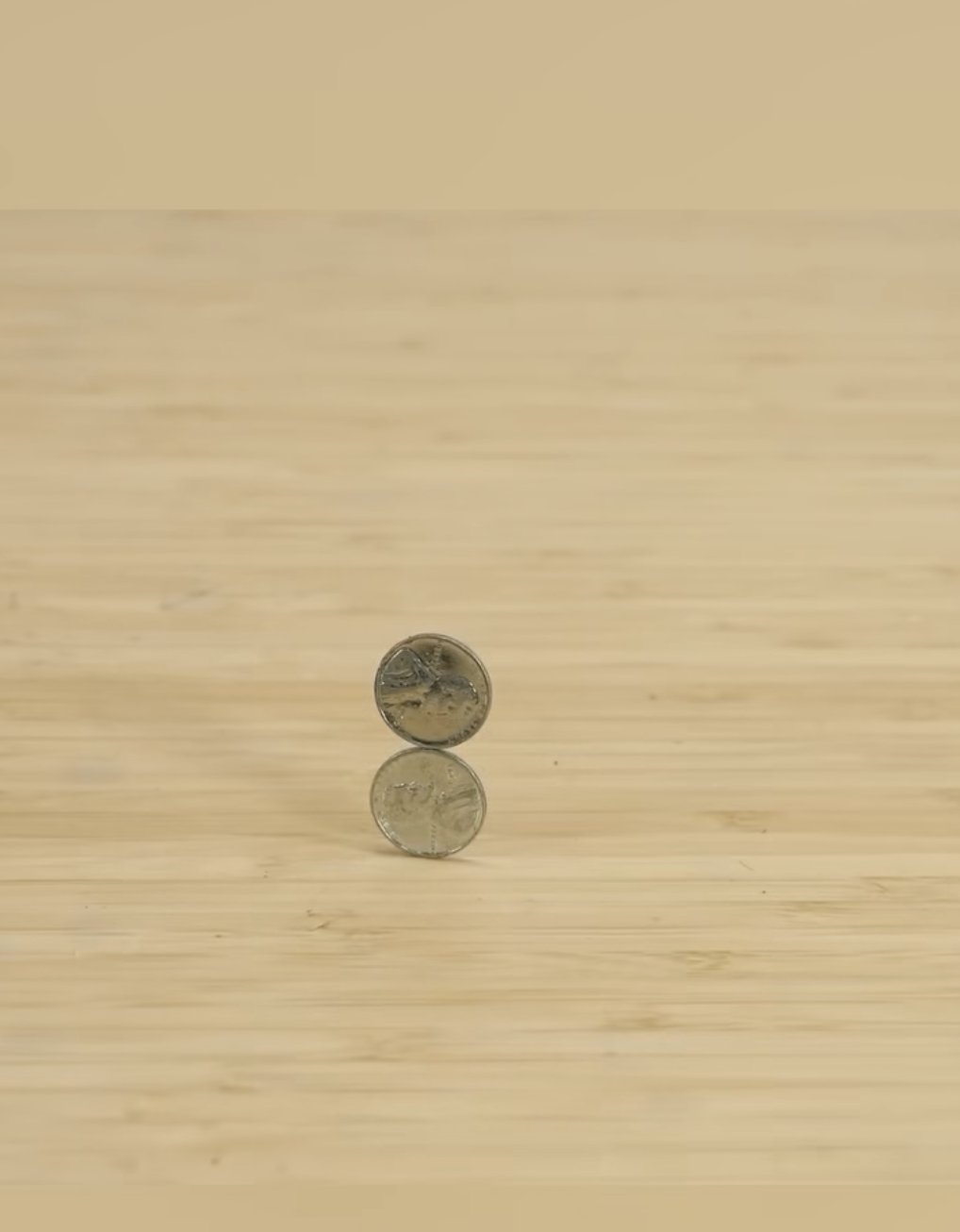 Is a three-sided coin possible?