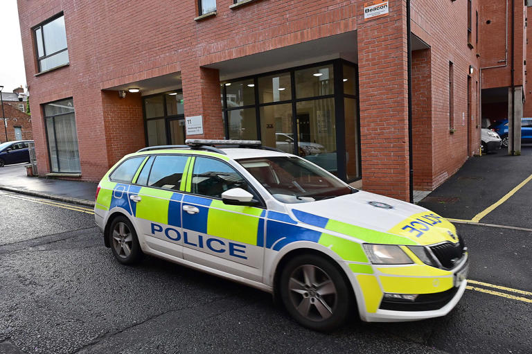 Lisburn: two people arrested as police launch murder inquiry following ...
