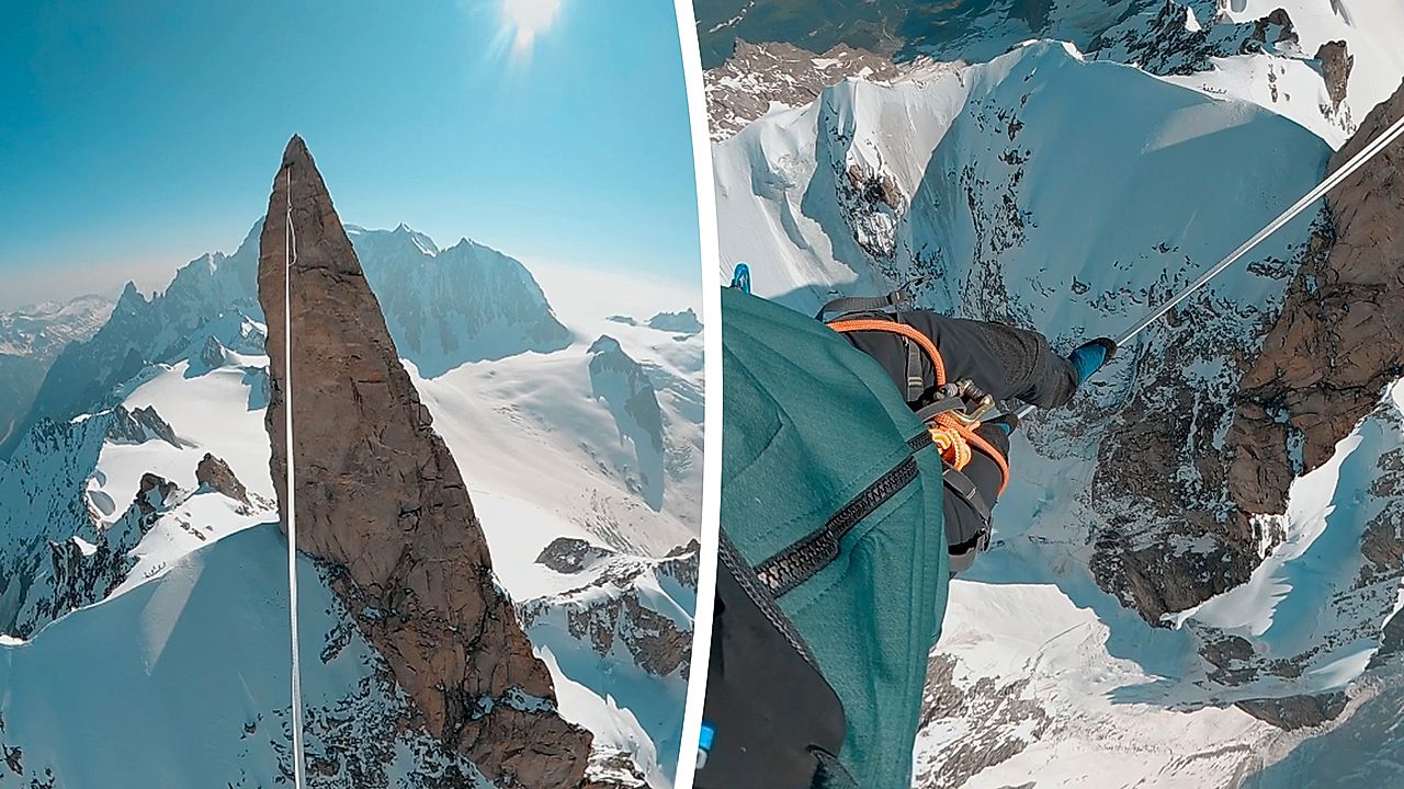 Daredevil tightrope walks over 2,000 feet between two 2.4-mile-high ...