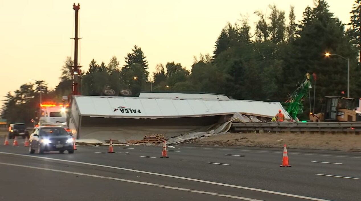 Semi-truck overturns in crash with suspected DUII driver