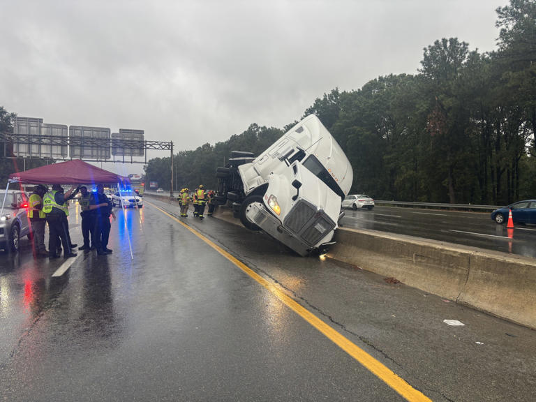 Driver in hospital after tractor-trailer flips on I-64 in Henrico