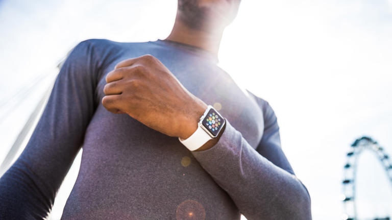 Have You Noticed Your Apple Watch Sensor Glowing Red? Here's What It's For