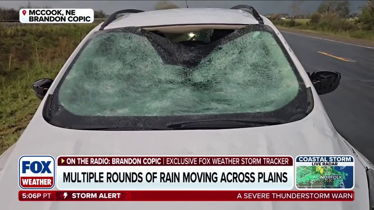 Hail storm leaves damaged car along Nebraska highway