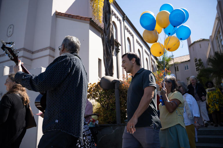 Our Lady of Lourdes parishioners pray and organize to save their church