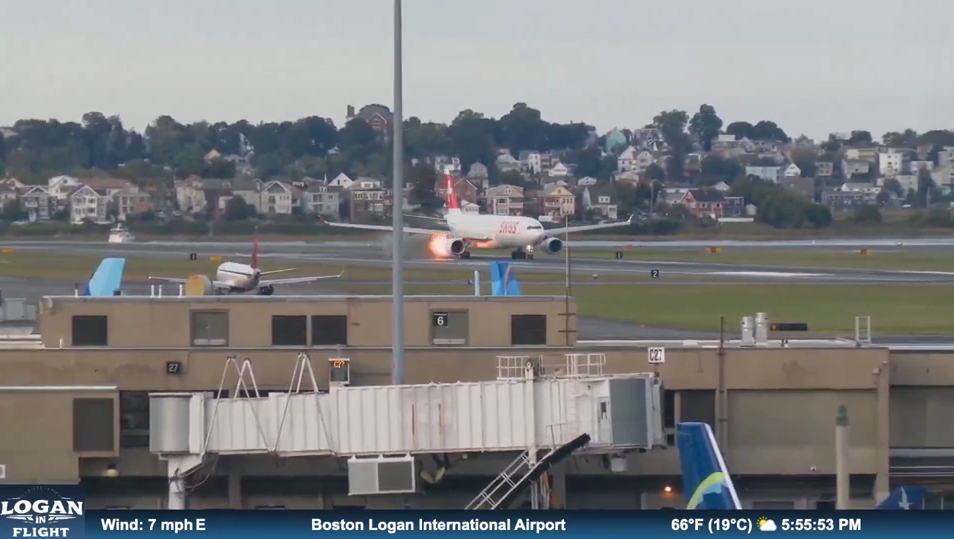 Flames shoot out of Swiss Airlines plane engine while on runway at ...
