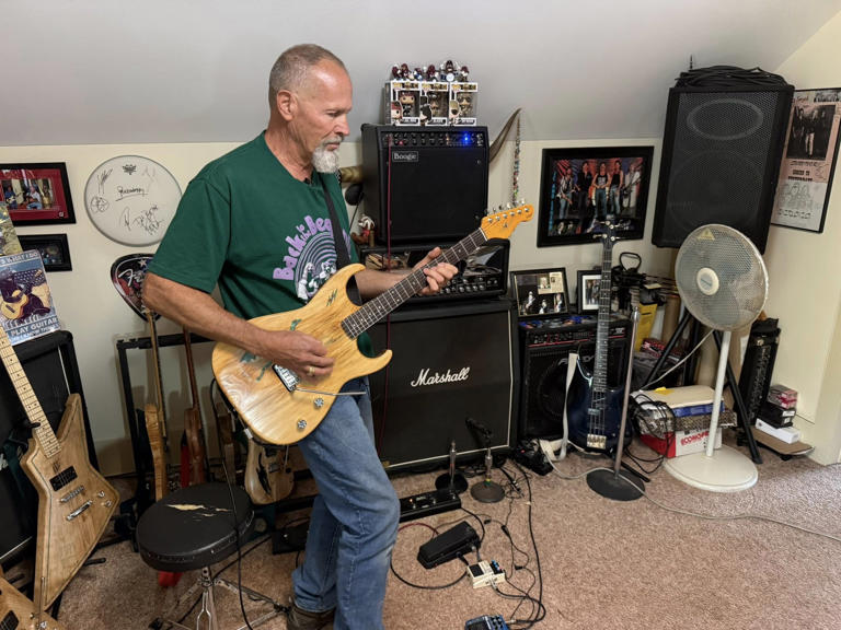 Portage ‘guitar guru’ slays on the instruments he builds from scratch