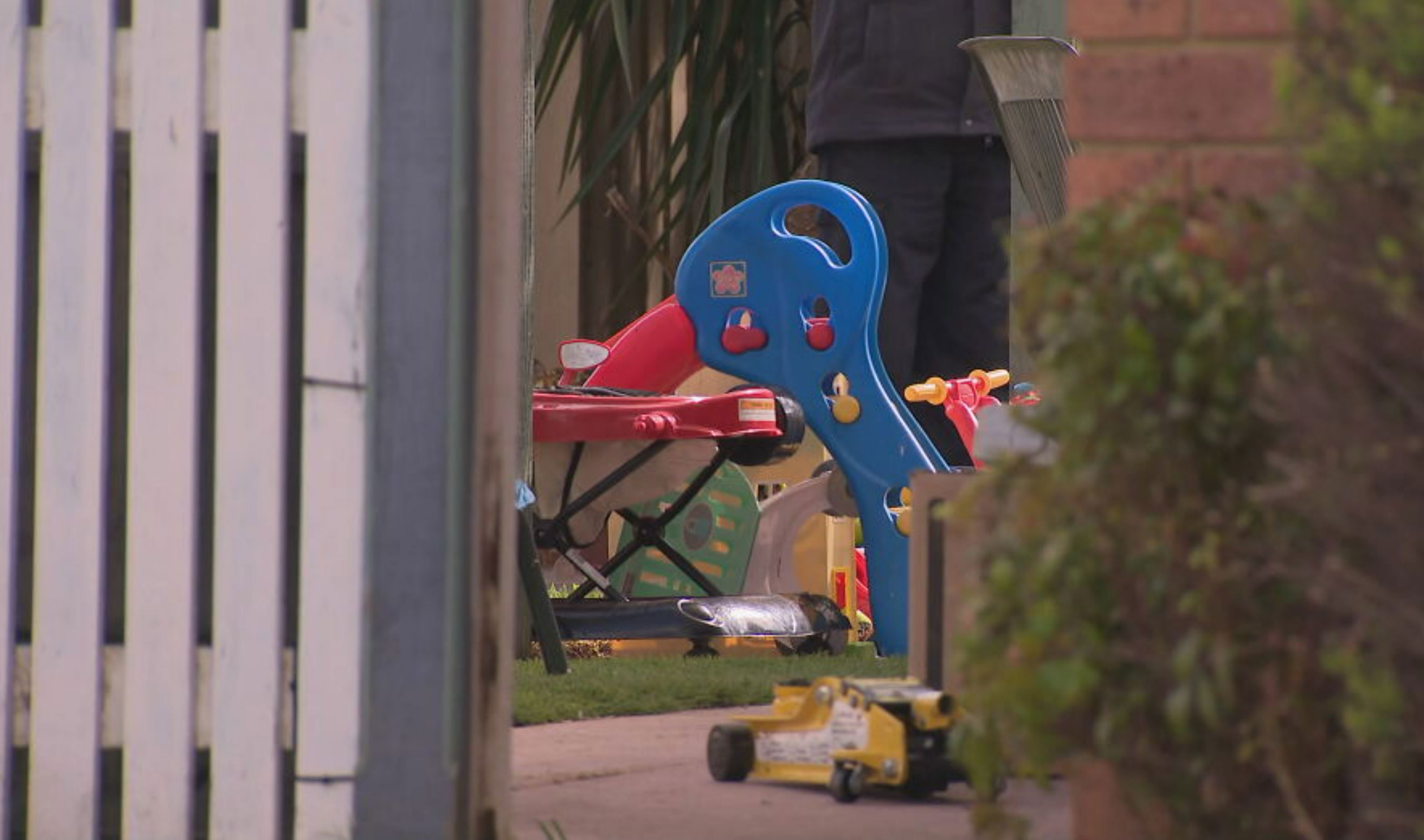 Mother charged over kids' deaths in fire skips court