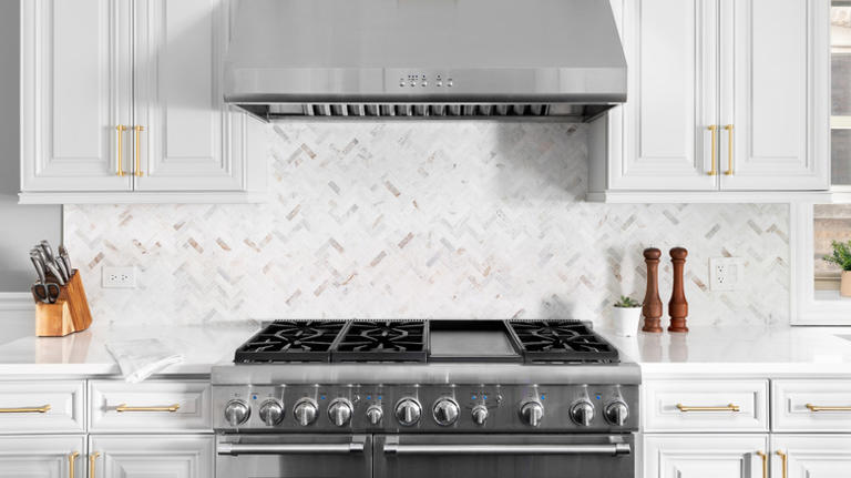 14 Backsplashes That Complement Stainless Steel Kitchens