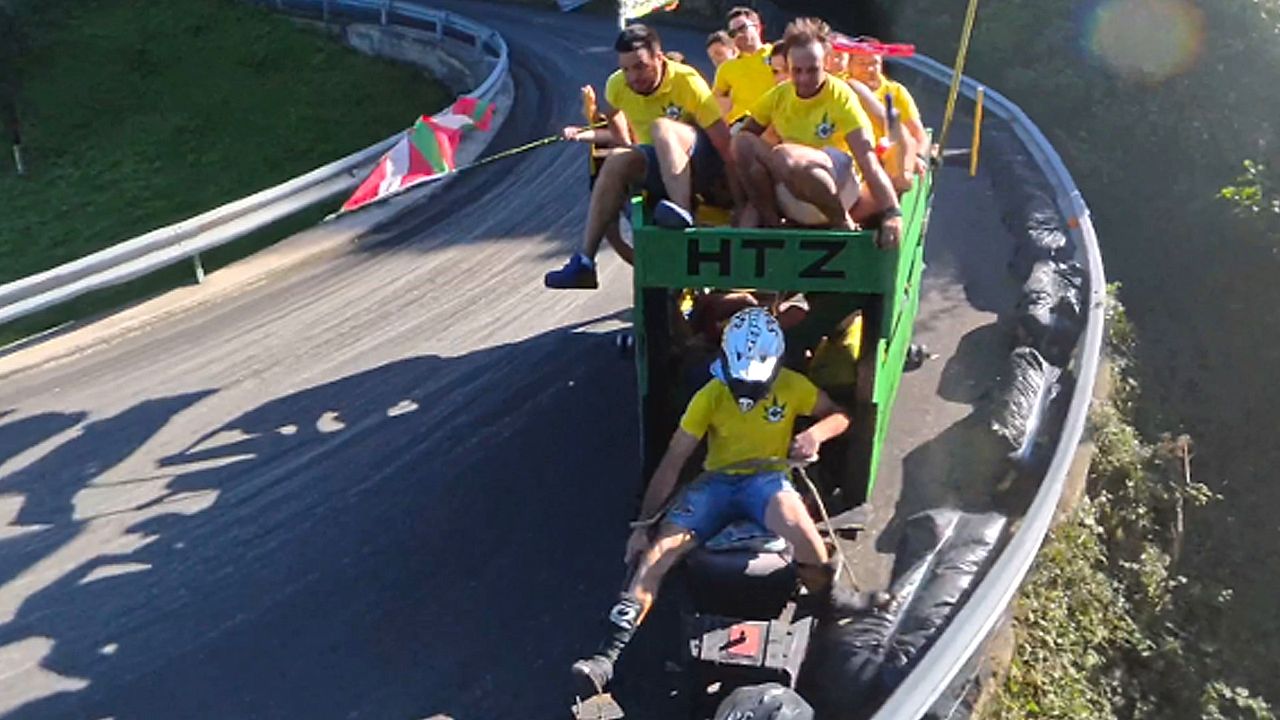Cart racers speeding downhill on road in Spain crash into guardrail