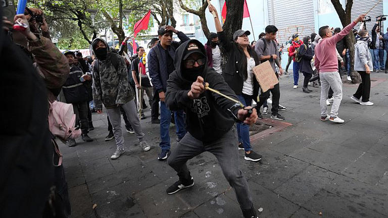Protesters clash with police in Quito over fuel subsidy cuts