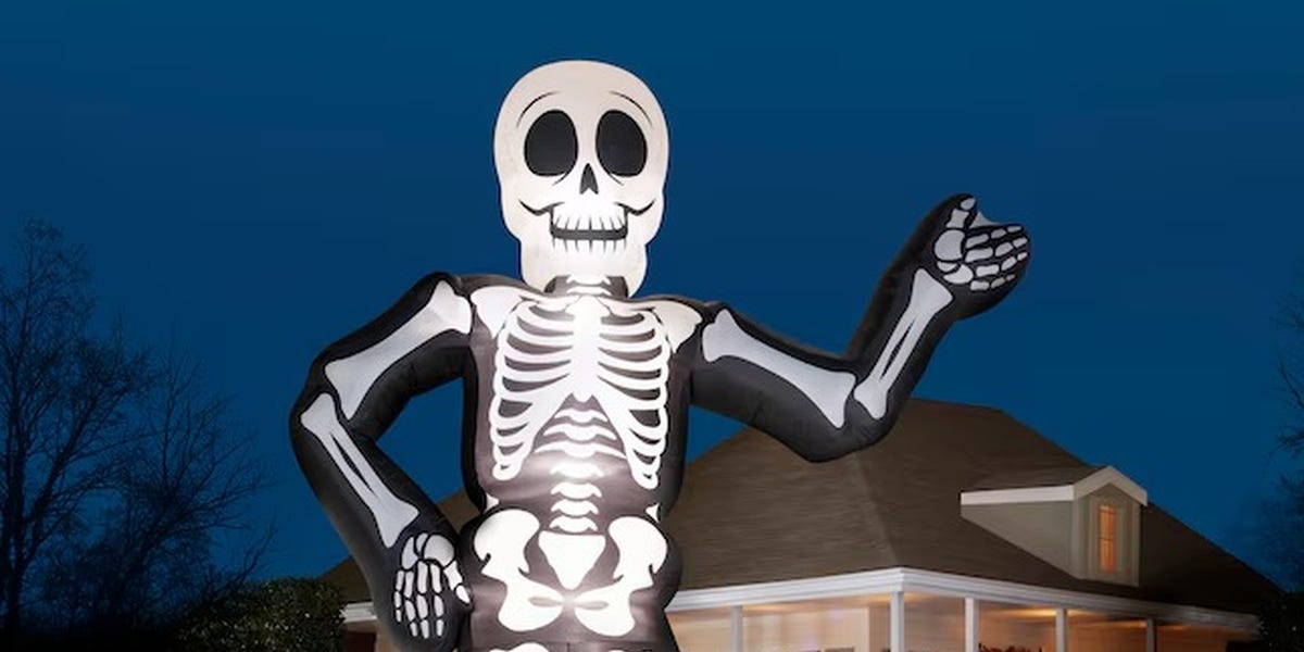 Lowe's New Halloween Skeleton Is EIGHT Feet Taller Than the Viral "Skelly”