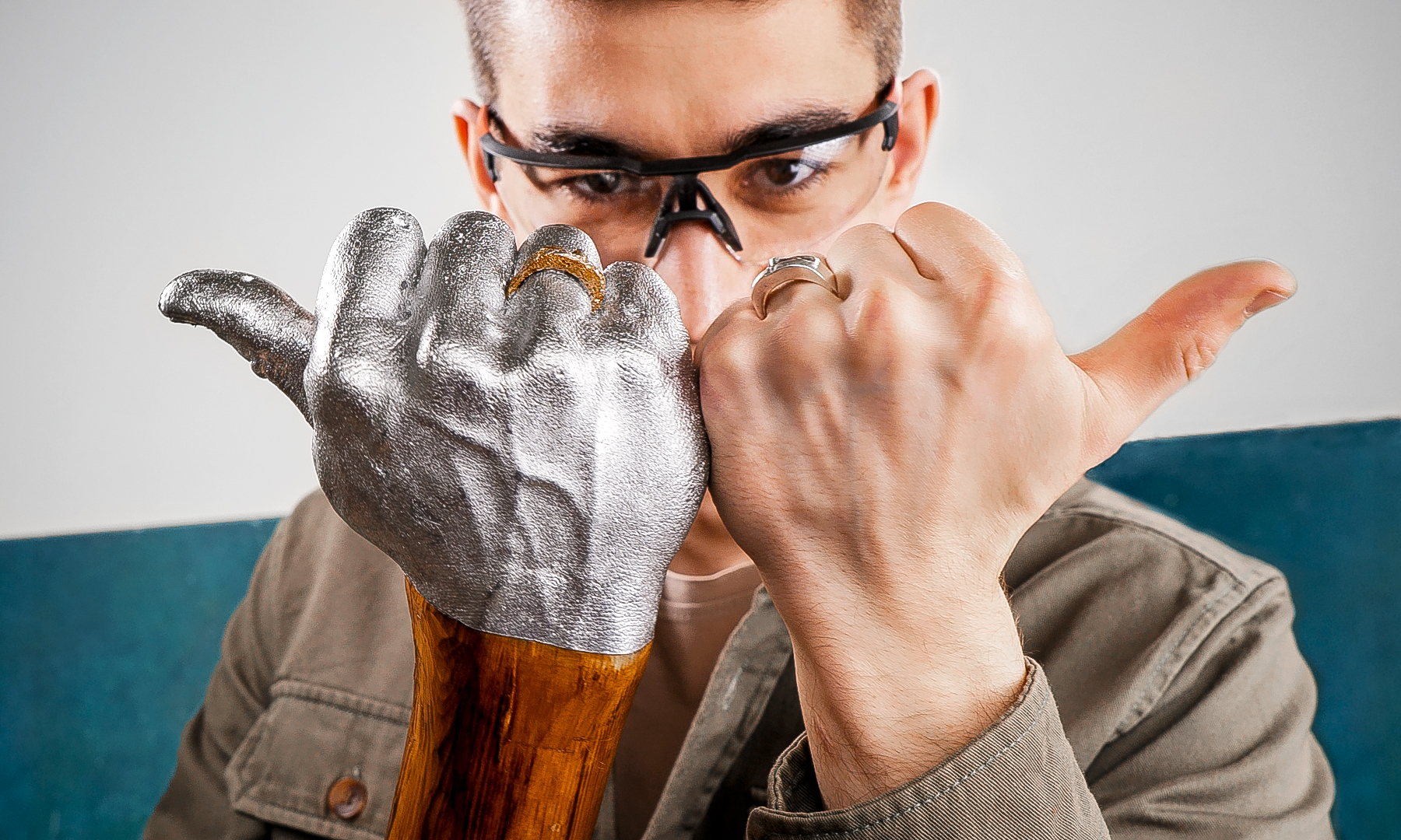 Step-by-step making of a hammer in the shape of a fist