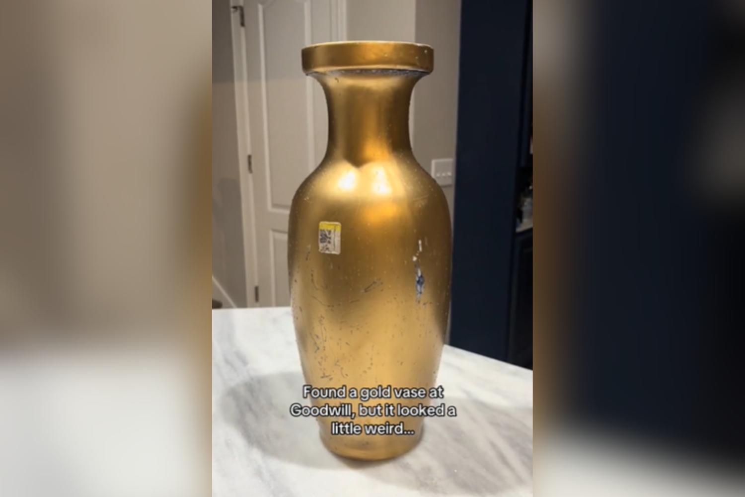Woman buys gold vase in Goodwill, can't believe what was hiding underneath