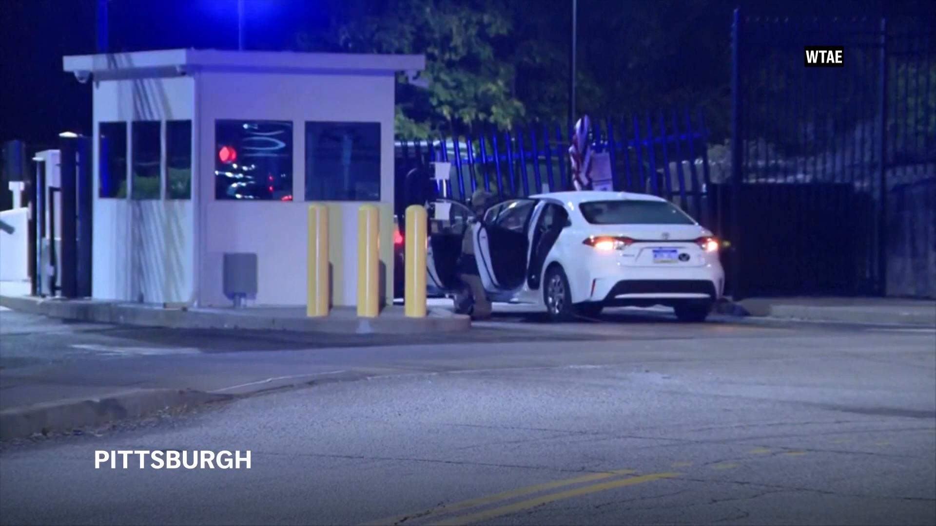 Suspect in custody after driver rams car into staffed security gate at ...