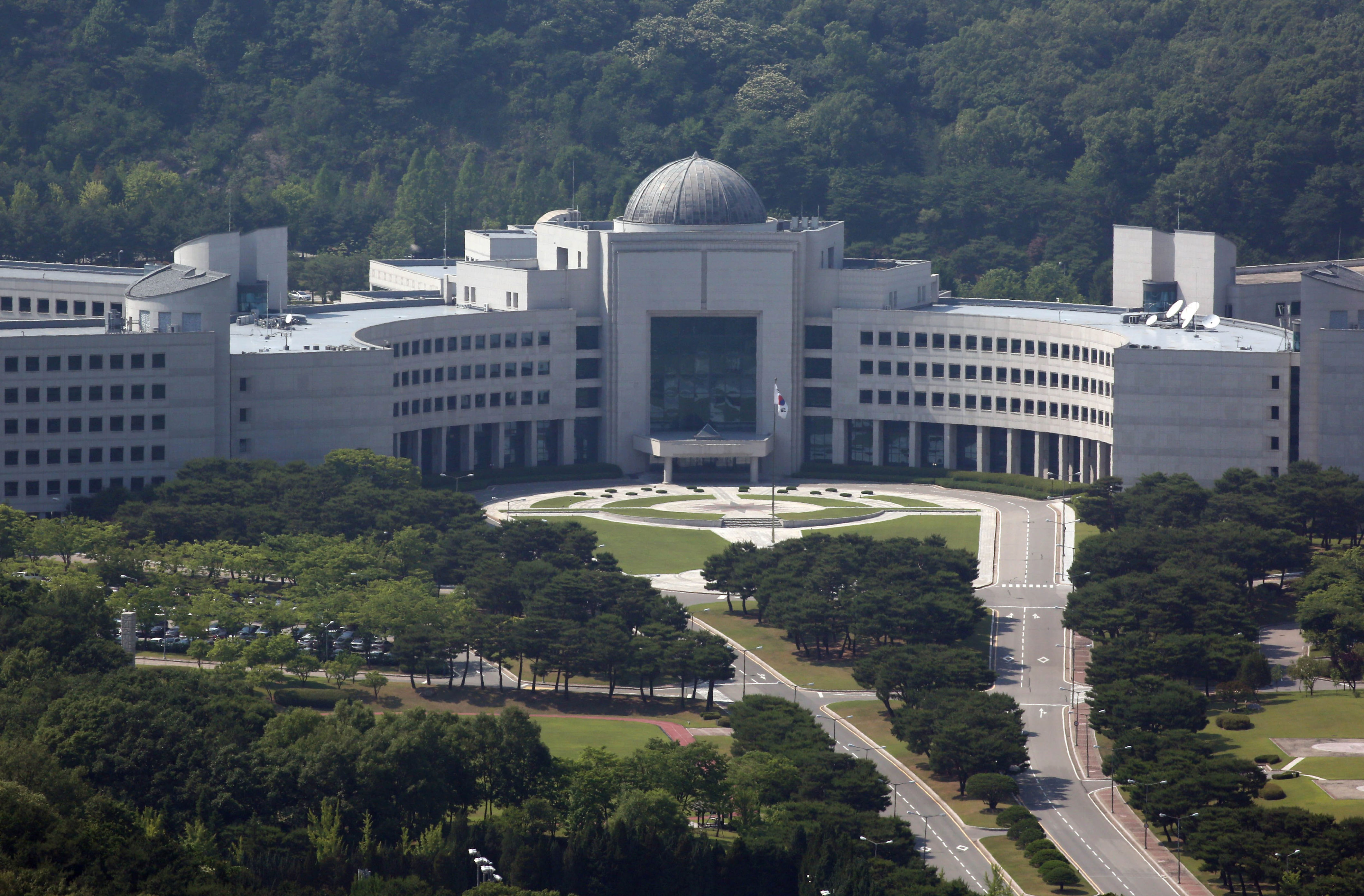 Special counsel team searches National Intelligence Service in martial ...