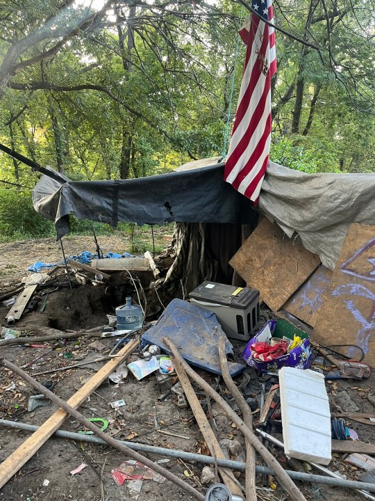 Lawrence police help move dozens from homeless encampment
