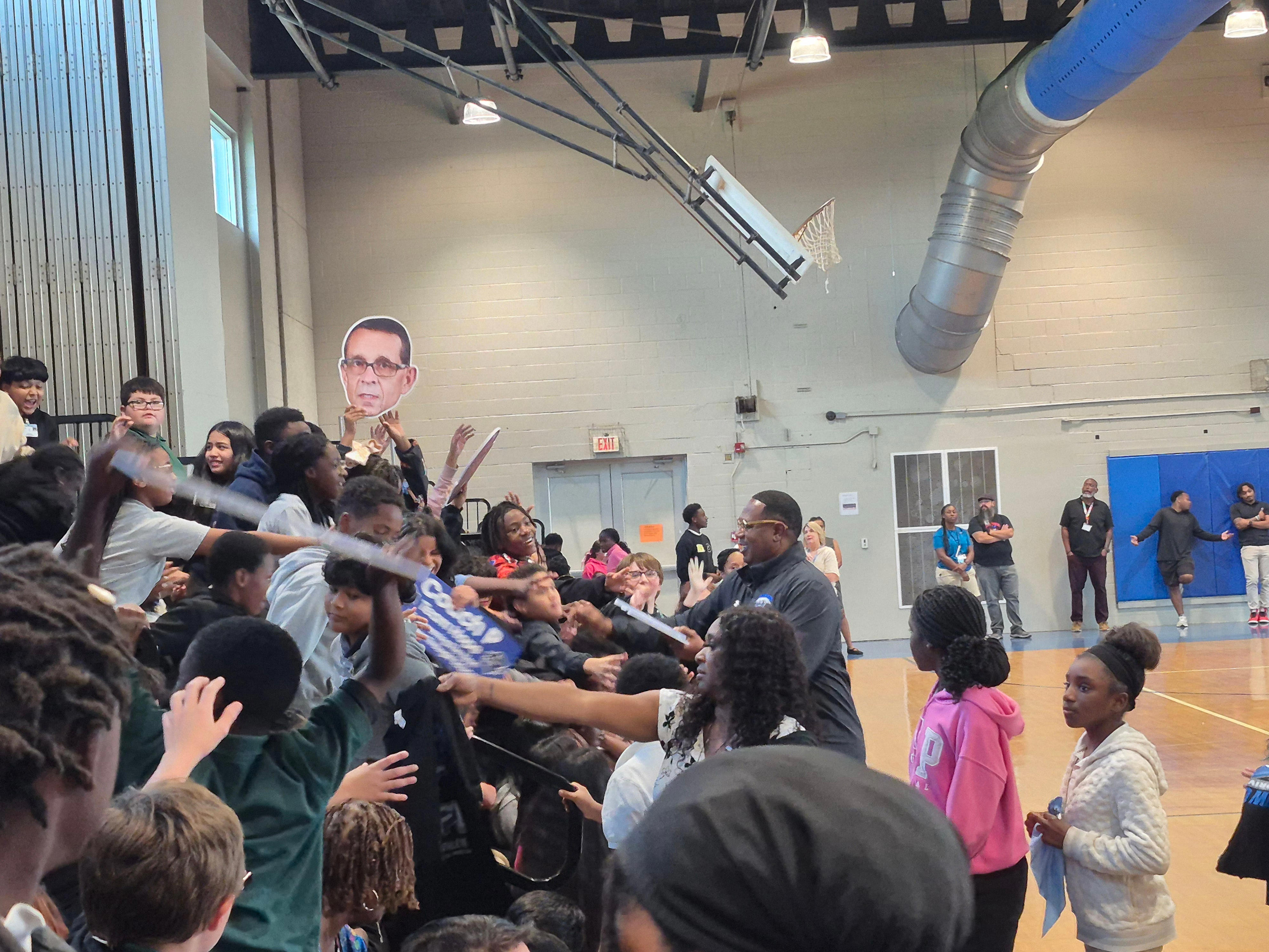 UNO basketball team makes surprise visit to Oaklawn Middle School students
