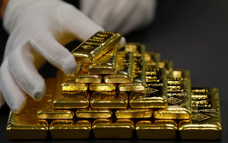 Gold rushes past record $5,000 in hedge against Trump