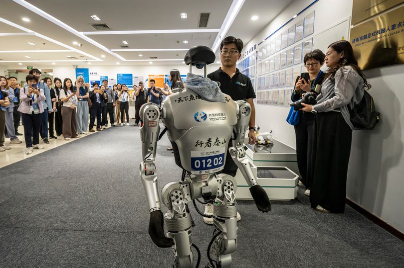 AI-powered assault rifles modified for horror humanoid Chinese robots ...