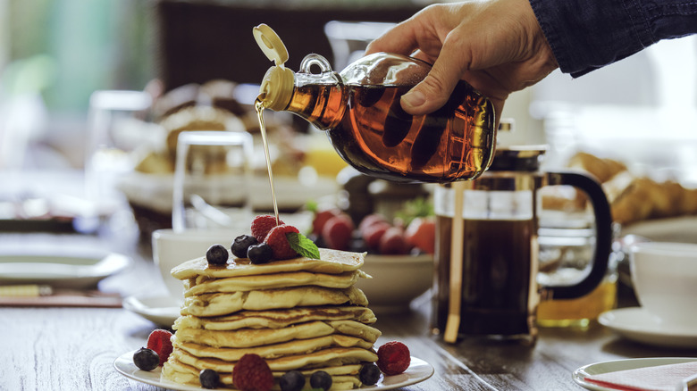 The History Of The Maple Syrup Bottle (And Why It Has A Tiny Handle)