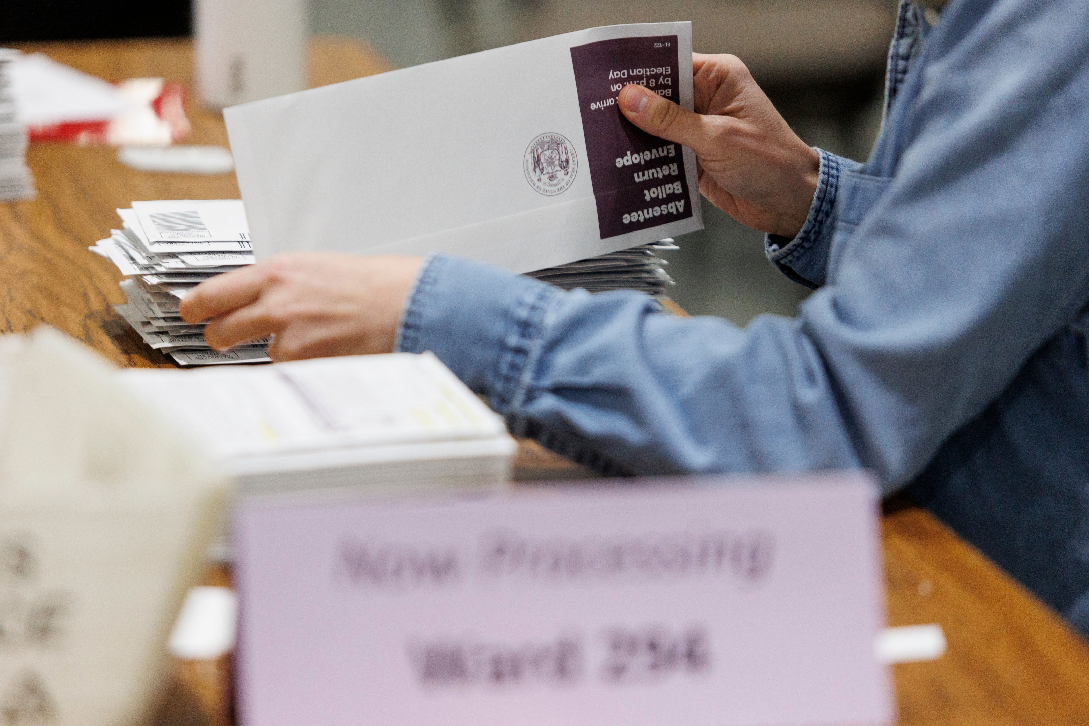 Wisconsin has a new bill to allow early start to absentee ballot ...