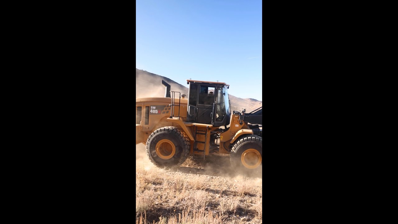 Watch me get dragged down the mountain by a runaway excavator!