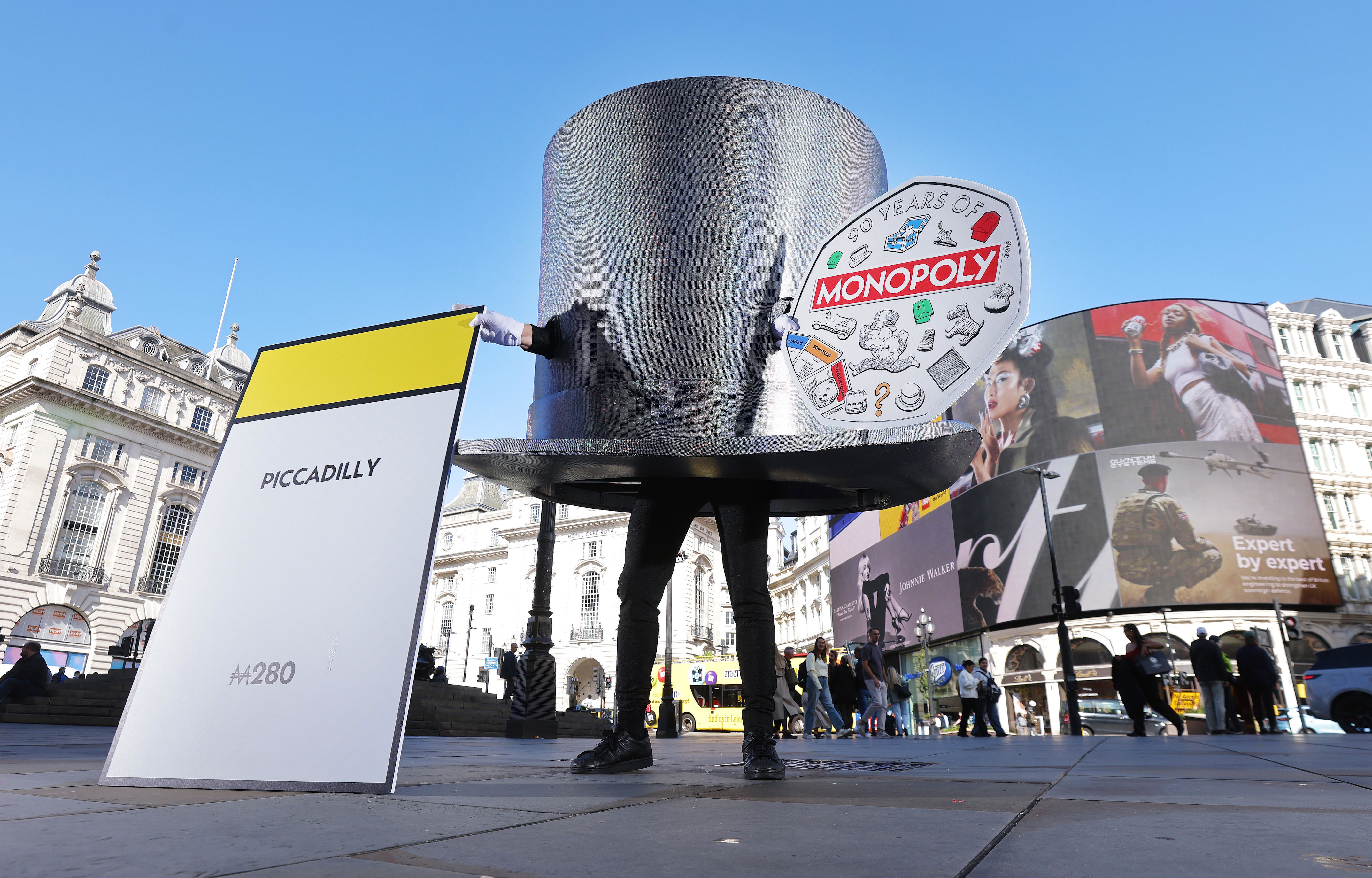Giant Monopoly ‘top hat’ roams London’s streets to celebrate new 50p coins