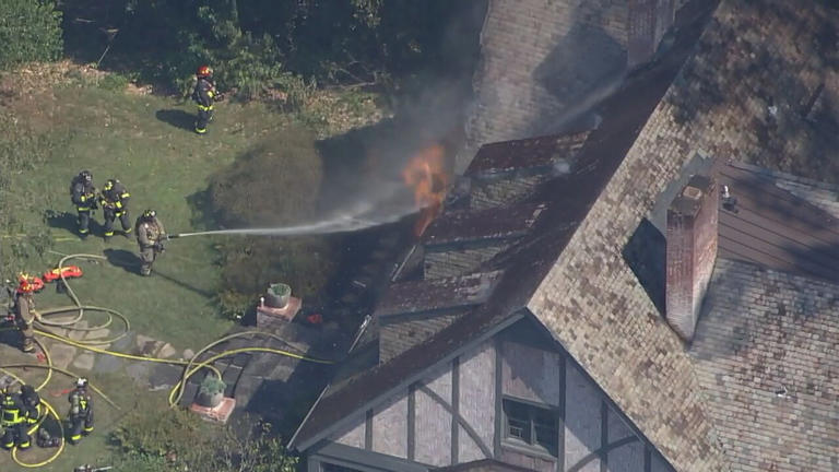 Crews battling large house fire in NW Atlanta