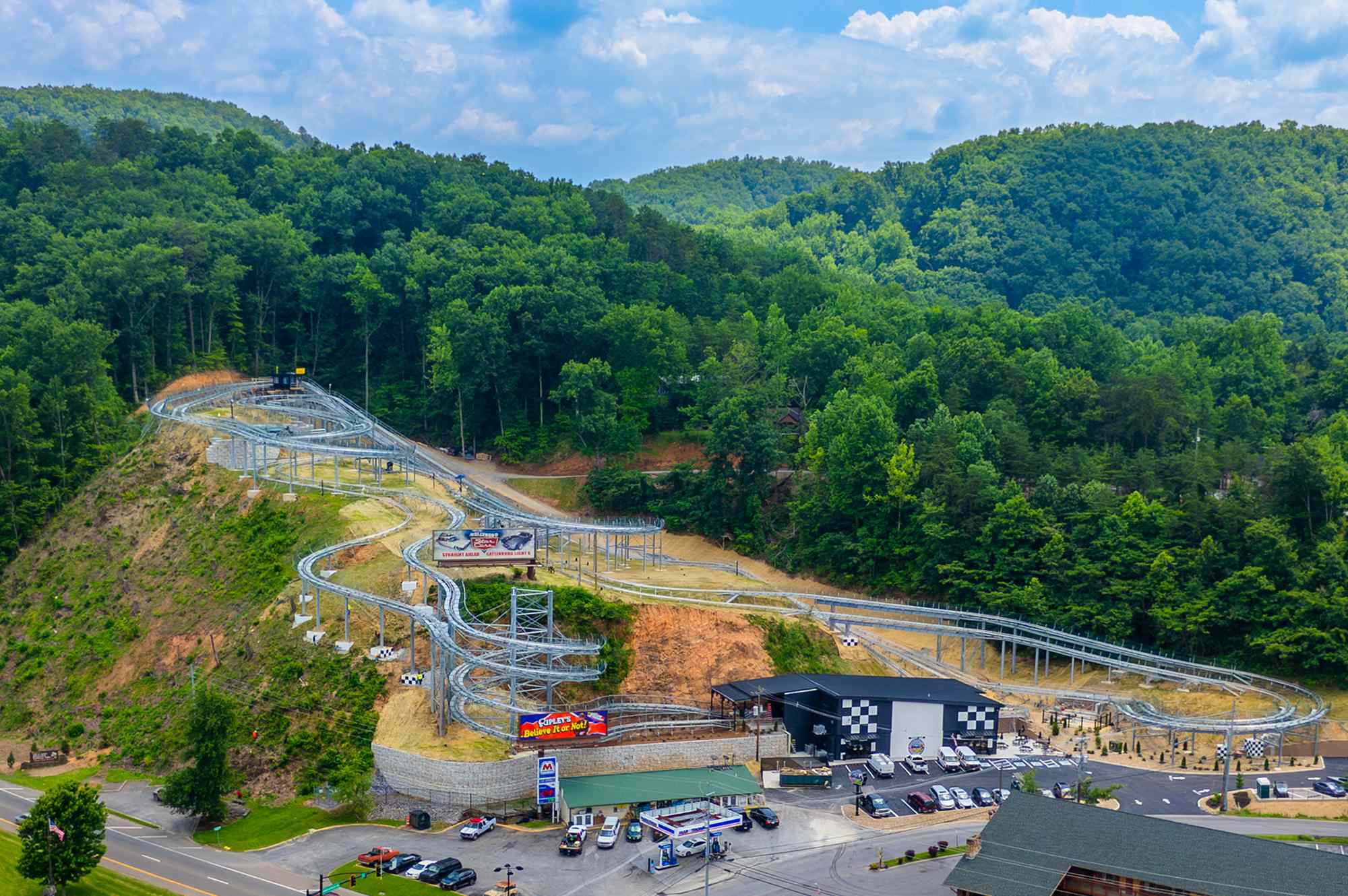 This Racing Mountain Coaster With Spirals, Helixes, and LED Night Rides ...