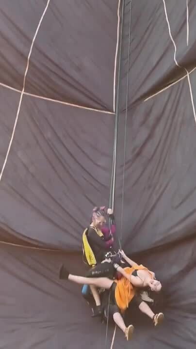 Daredevils Attach Themselves to Top of Hot Air Balloon