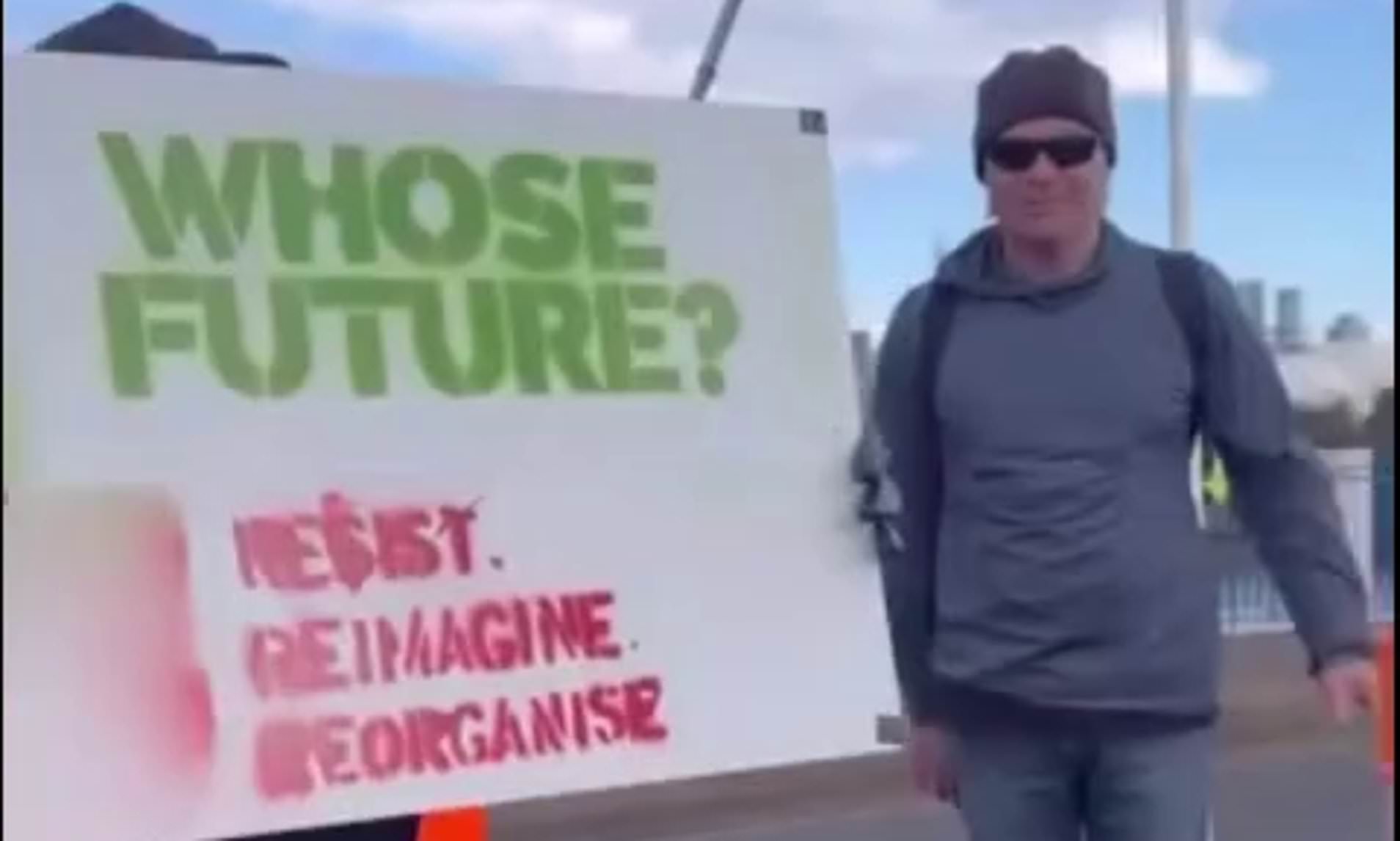 Climate change protesters block off major Melbourne bridge - causing ...