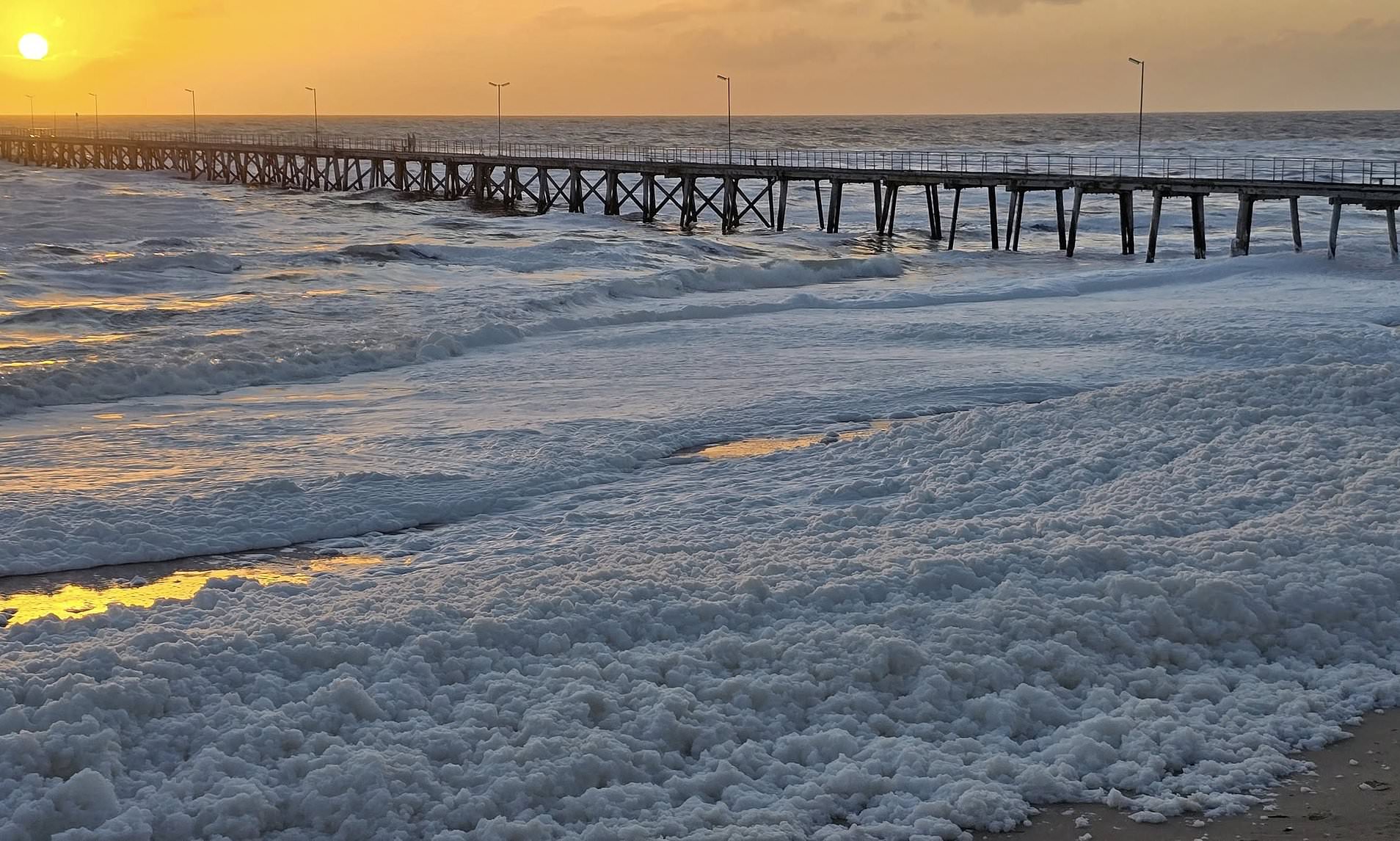Locals stunned after mountain of sea foam emgulfs a popular beach