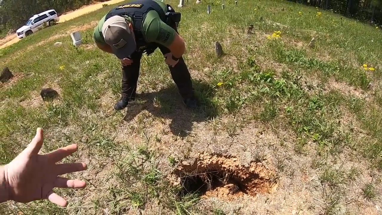 Police called after open grave found in abandoned cemetery