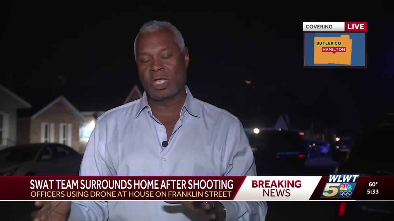 SWAT team surround home after shooting